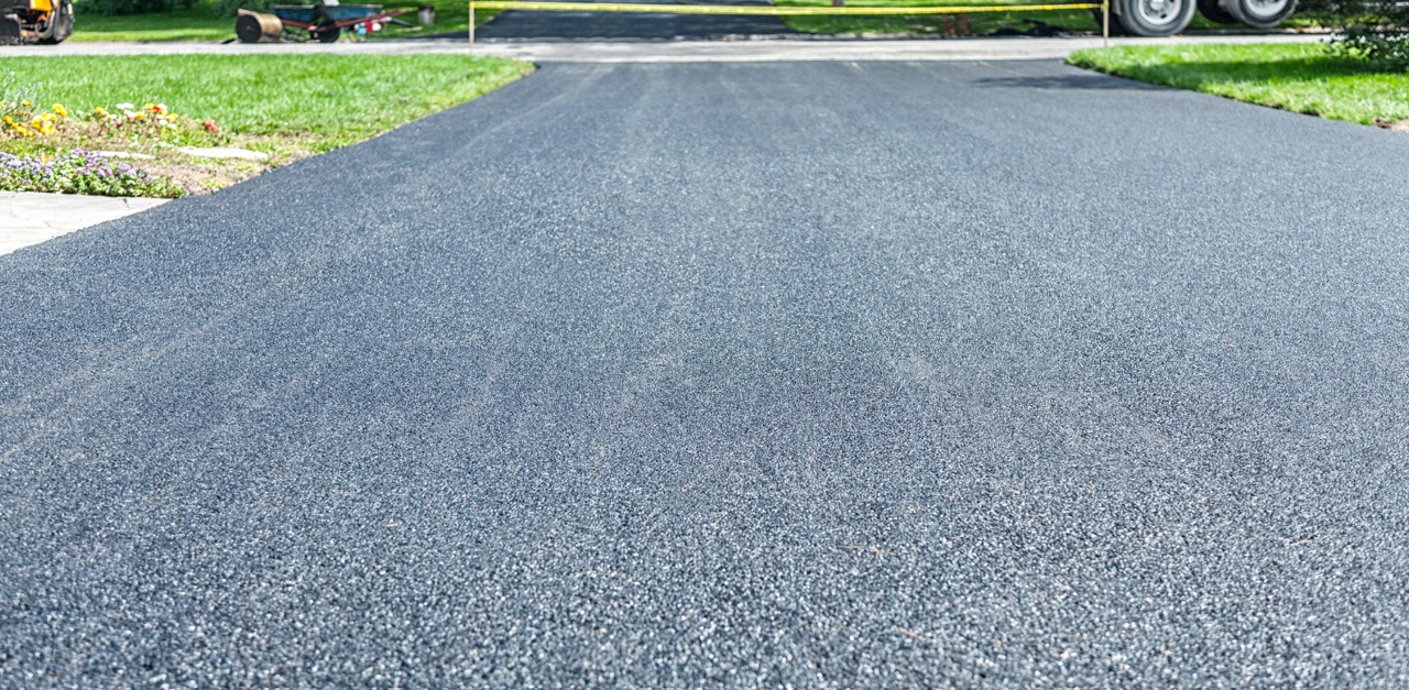 Removing Oil Stains from Asphalt | Crossroads Paving CT